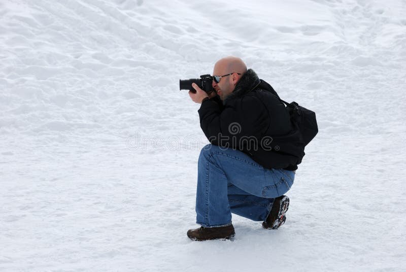 Photographer Shooting in Snow Stock Image - Image of shooting, exercise ...