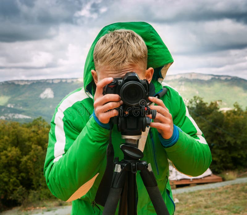 Photographer With Camera On Tripod Stock Image - Image of portrait ...