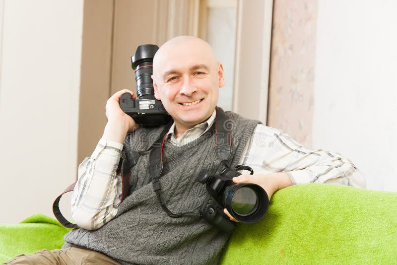 Photographer Sitting on Couch Stock Photo - Image of photoreporter ...