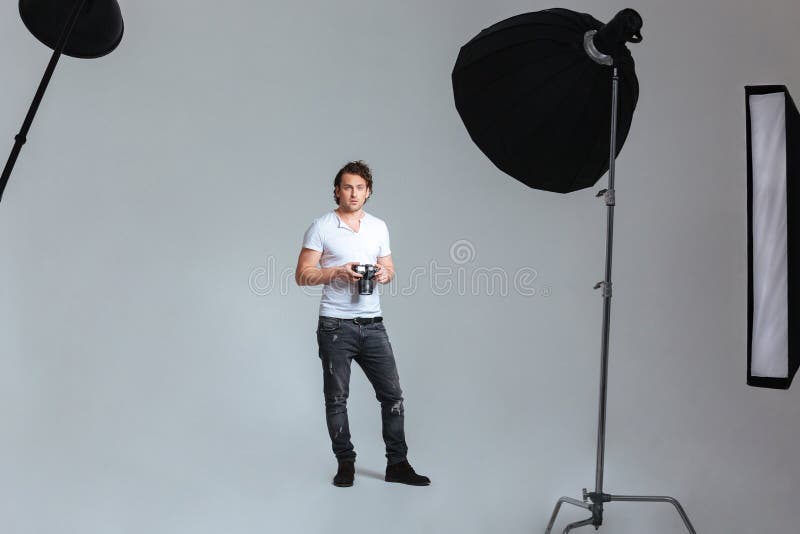 Photographer Standing in Professional Studio Stock Image - Image of ...
