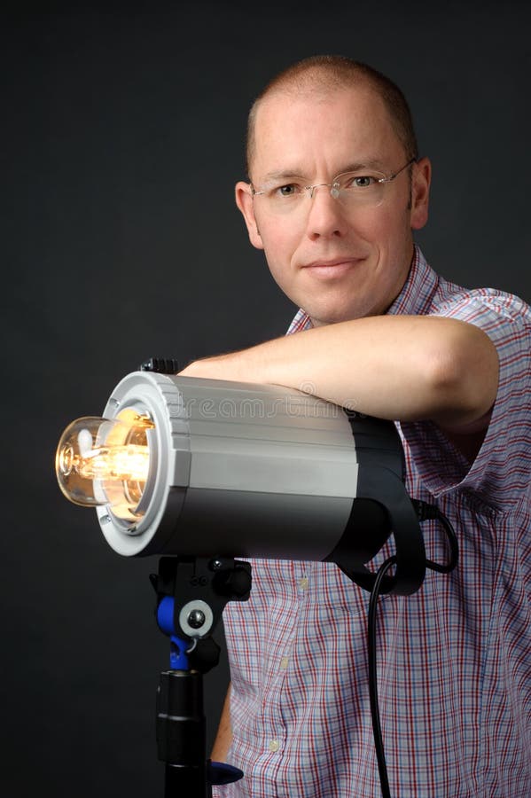 Photographer with Studio Flash Stock Image - Image of accessory, flash ...
