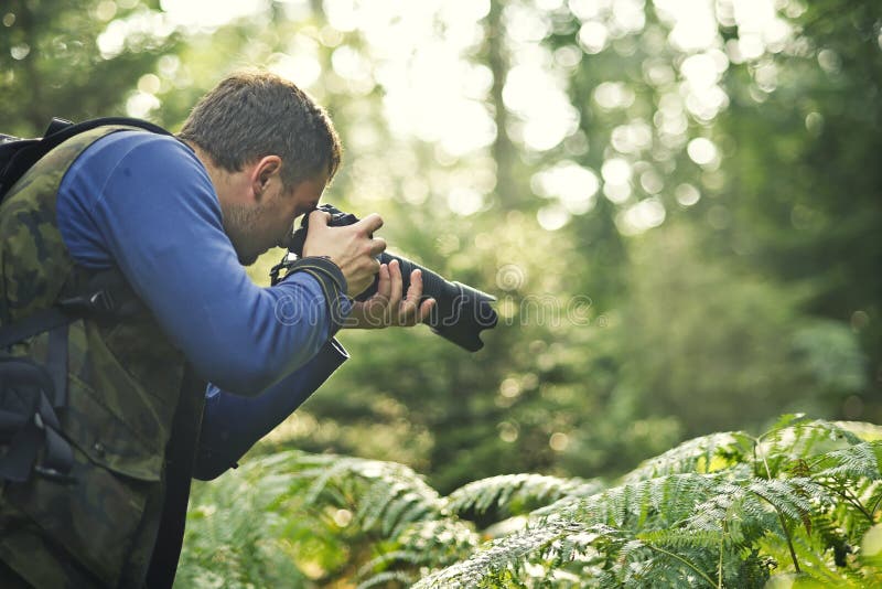 Photographer stock photo. Image of forest, photographer - 62384680