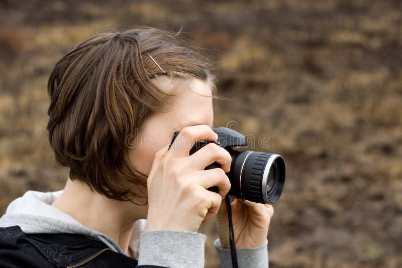 Photographer Taking Pictures with SLR Camera Stock Photo - Image of ...