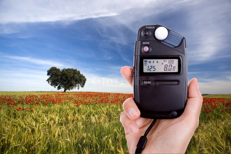 Photographer Using Lightmeter To Measure Light Stock Image - Image of ...