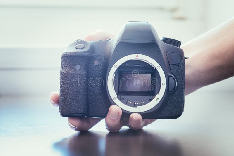 Photographer is Using a Professional Camera, Open Sensor Stock Photo ...