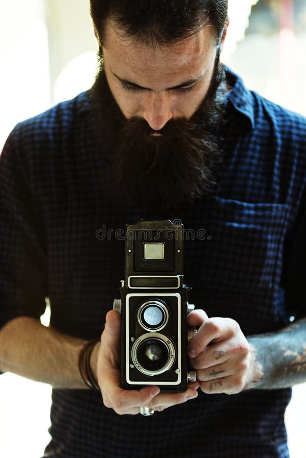 Photographer Using a Vintage Camera Stock Image - Image of person ...