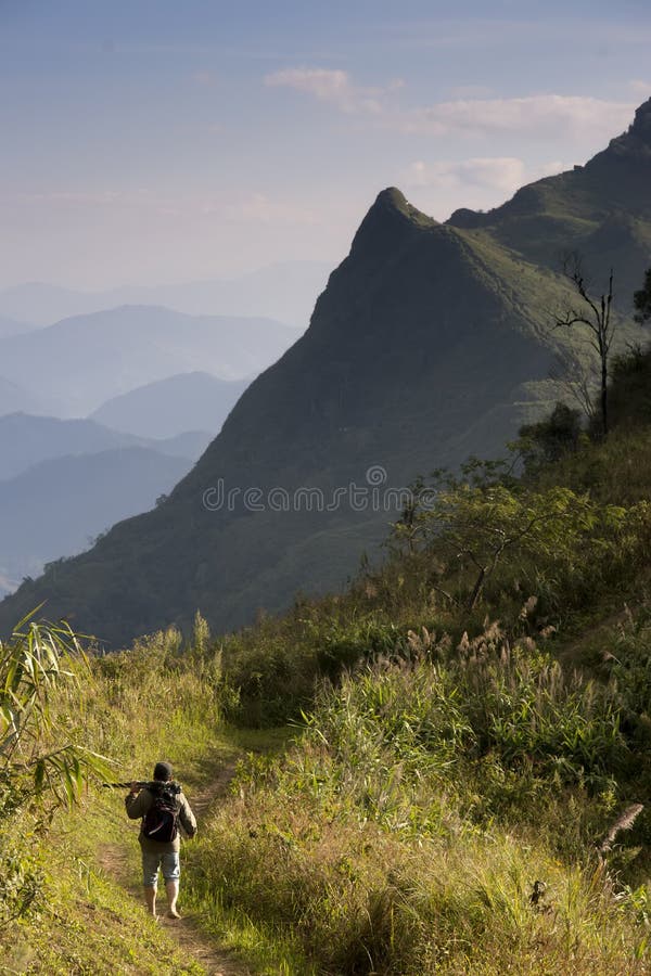 The Photographer is Walking Down the Mountain Path Stock Image - Image ...