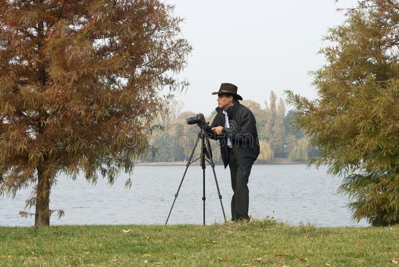 Photographer at work stock image. Image of hobby, amateur - 21865027