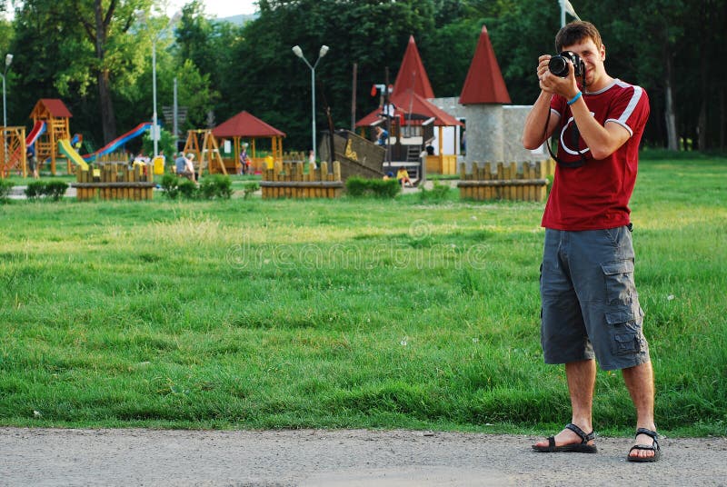 Photographer at work stock photo. Image of focusing, outdoors - 9708126