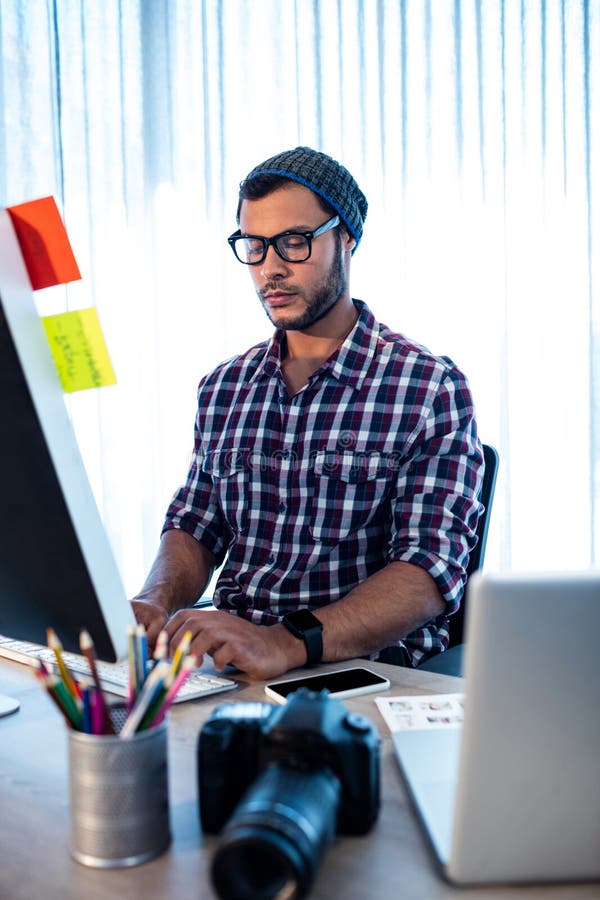 Photographer Working at Computer Desk Stock Image - Image of profession ...