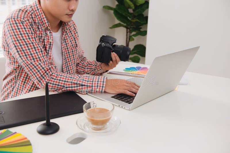 Photographer Working at Desk in Modern Office Stock Photo - Image of ...