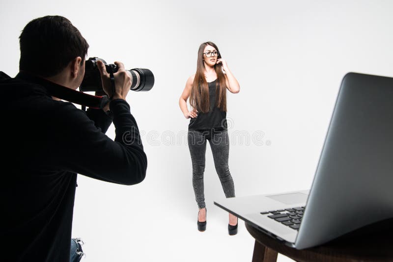 Photographer Working with Model in Equipped White Studio Stock Photo ...