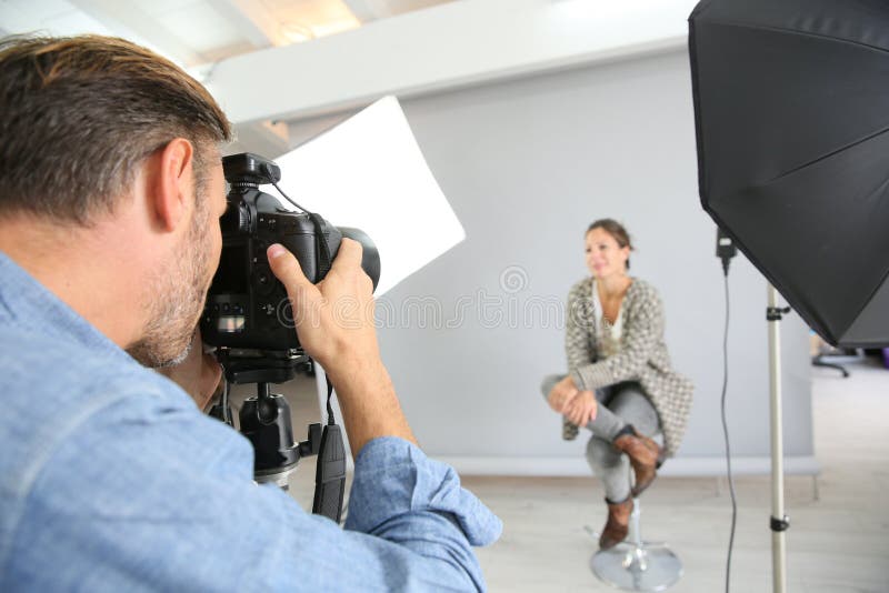 Photographer Working in Studio Shooting Woman Model Stock Image - Image ...