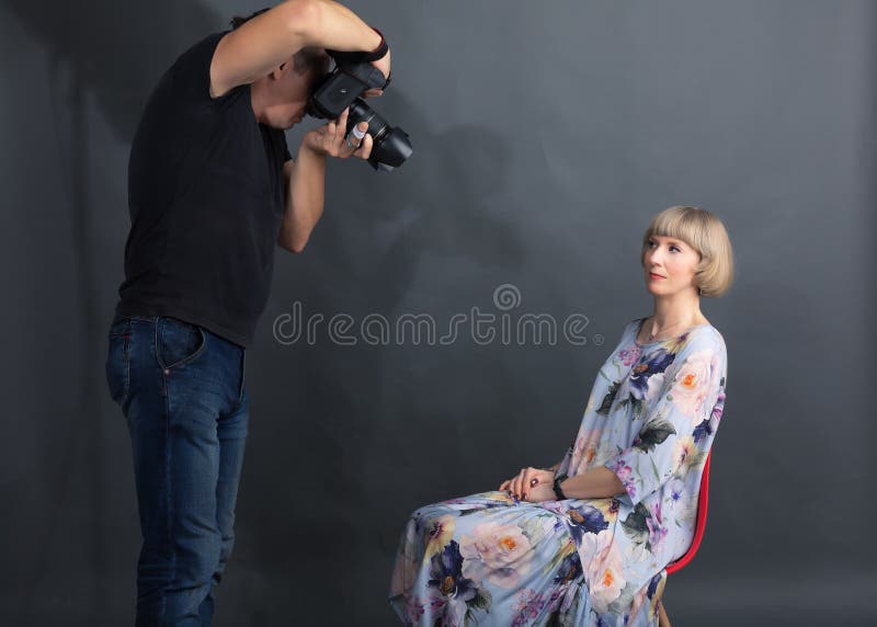 Photographer Works with a Client in the Studio Stock Image - Image of ...