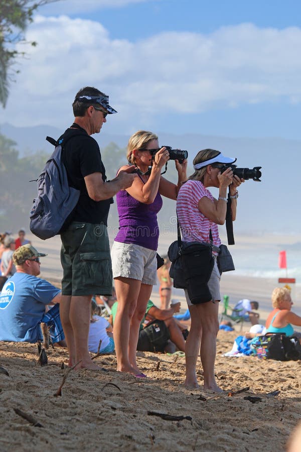 Photographers on beach editorial photo. Image of women - 42508761