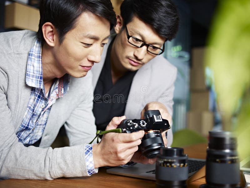 Photographers at work stock image. Image of coworkers - 69472281