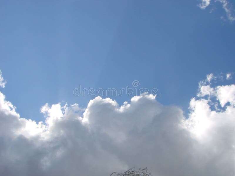 A Photography of a Blue Sky with Sun Rays Stock Photo - Image of cloudy ...