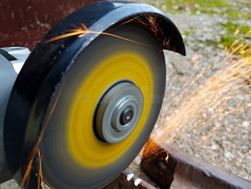 Electric Angle Grinder in Work Stock Photo - Image of sparks, grinder ...