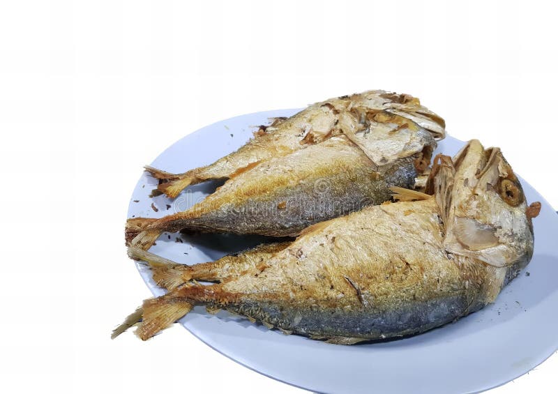 A Photography of a Plate of Fish on a White Table, There are Two Fish ...