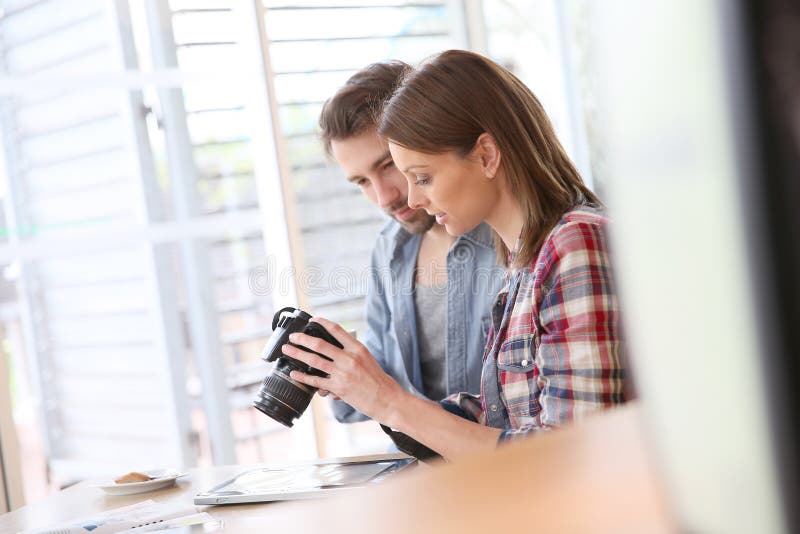 Photography Students Working Together Stock Photo - Image of couple ...