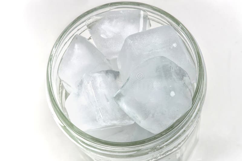 Jam pot with ice cubes stock photo. Image of cream, tableware - 247648046