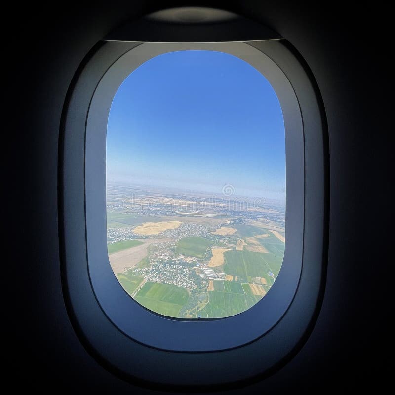 Plane window day stock image. Image of window, background - 246833393