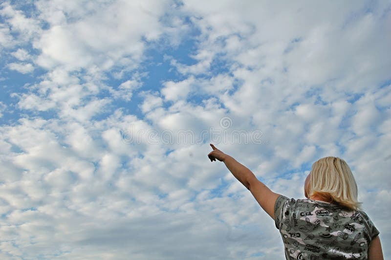 Photography of Woman Pointing at Cloudy Sky Stock Image - Image of ...