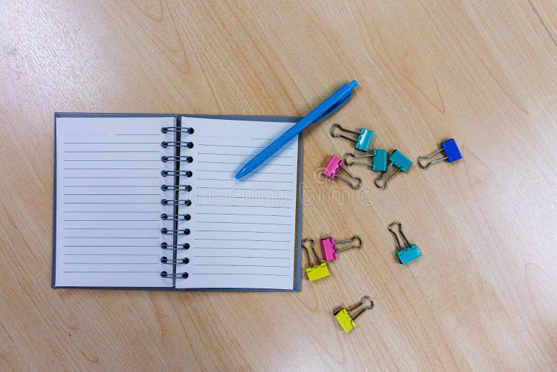 Photos of Notepad and Blank Paper Clips on the Table Stock Image ...