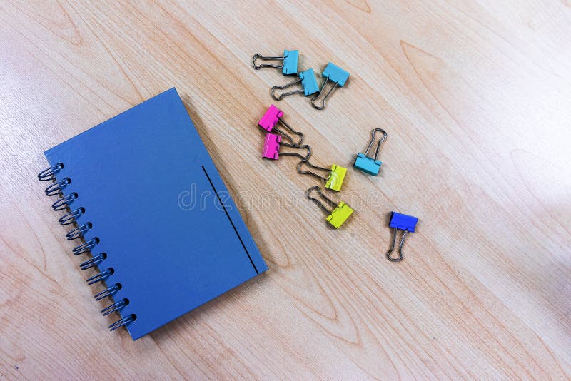 Photos of Notepad and Blank Paper Clips on the Table Stock Photo ...