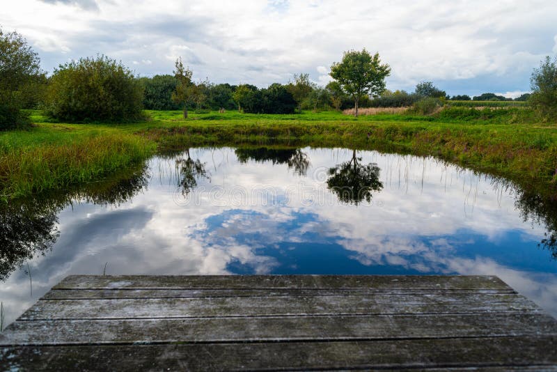 Photos of a Small Pond between Fields in Northern Germany with a ...