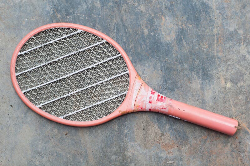 Broken Mosquito Racket on Gray Abstract Textured Cement Background ...
