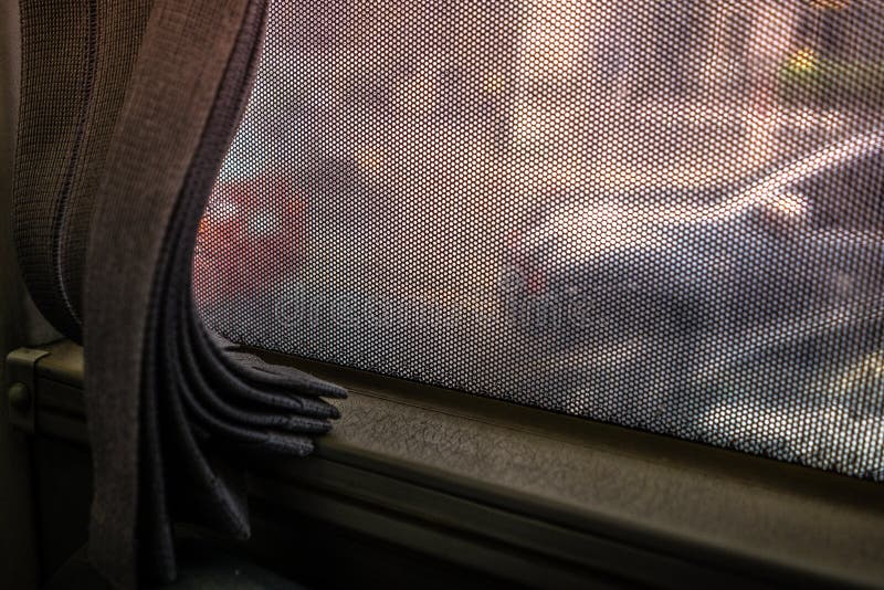 Photos of the Windows in the Bus, with Blinds and Soft Focus of the Car ...