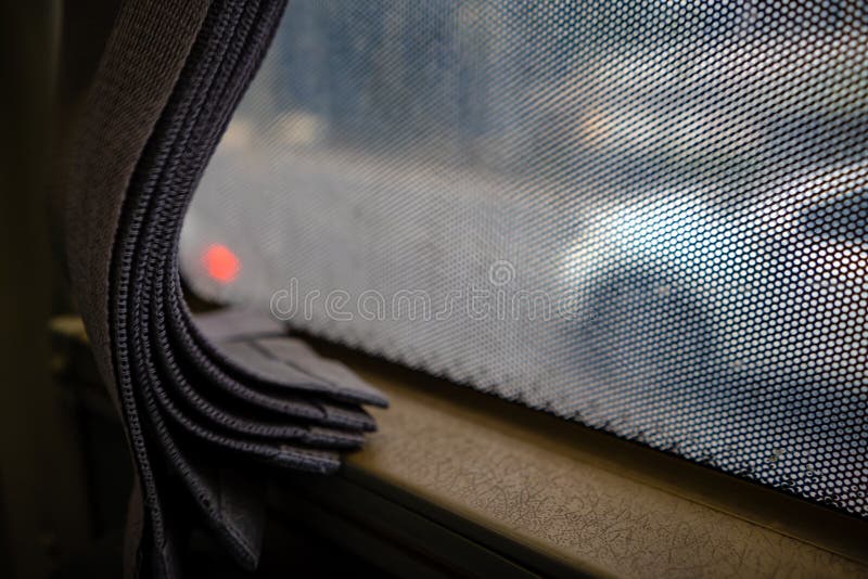 Photos of the Windows in the Bus, with Blinds and Soft Focus of the Car ...