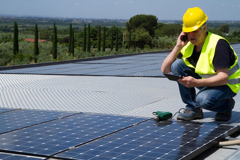 Photovoltaic Engineer or Installer Installing Solar Panel Stock Image ...