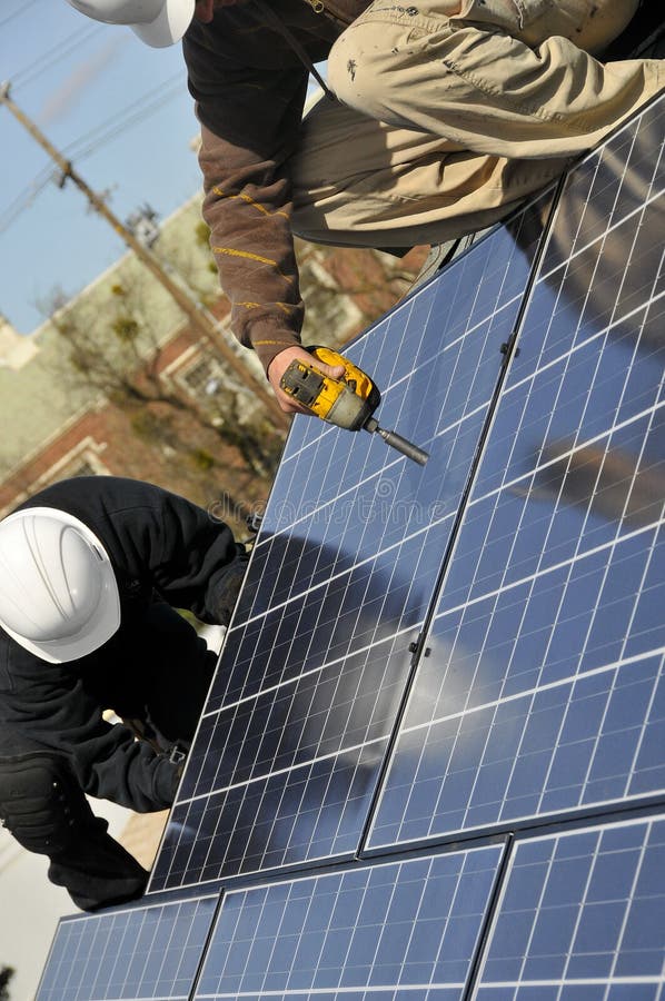 Adjusting Solar Panels 2 stock photo. Image of alternative - 18731010