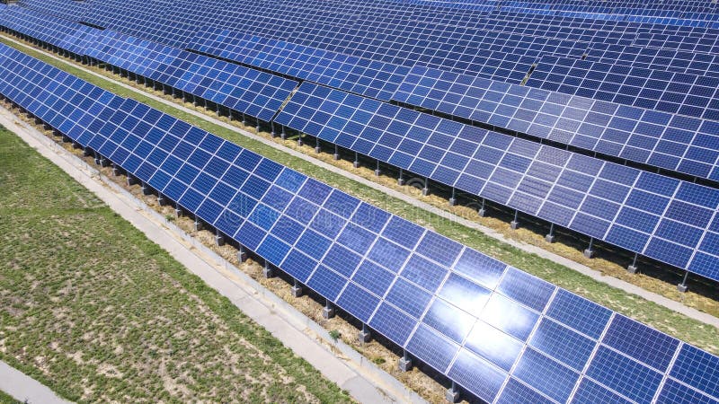 Photovoltaic Modules in a Power Plant with Solar Reflection Stock Photo ...