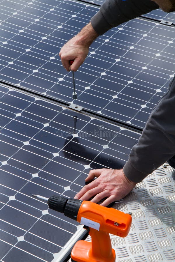 Photovoltaic worker stock photo. Image of building, power - 75190520