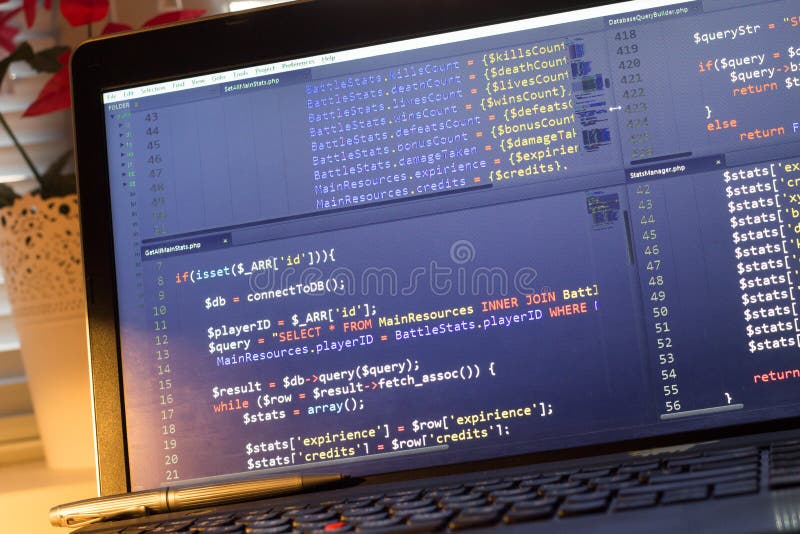 PHP Back-end Code Zoomed through a Magnifier. Computer Programming Source Code Lookup Stock ...