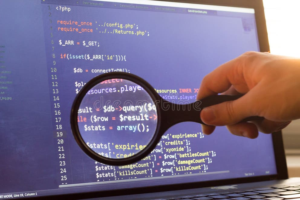 PHP Back-end Code Zoomed through a Magnifier. Computer Programming Source Code Lookup Stock ...