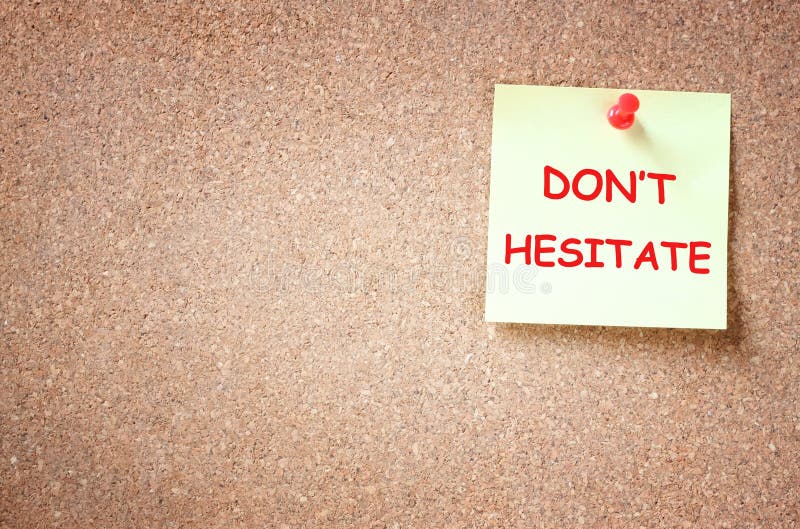 The Phrase Dont Hesitate Written on Sticky Note Over Cork Board Stock ...