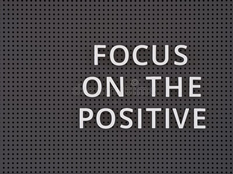 Phrase Focus on the Positive Spelled Out with White Letters on Gray ...