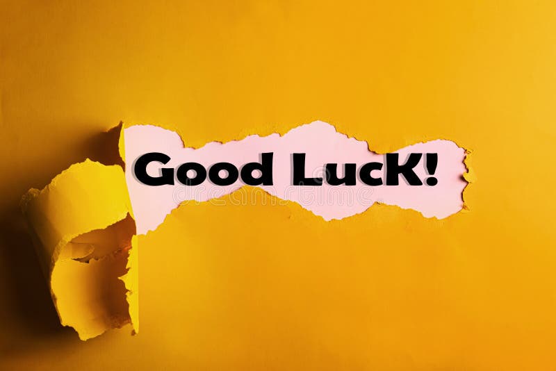 Phrase GOOD LUCK On Pink Background, View Through Hole On Paper Stock ...
