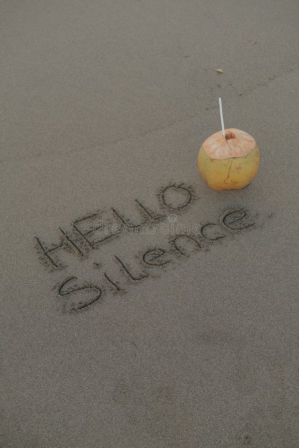 Hello Silence – Handwritten Message on Volcanic Sand with Coconut Drink ...