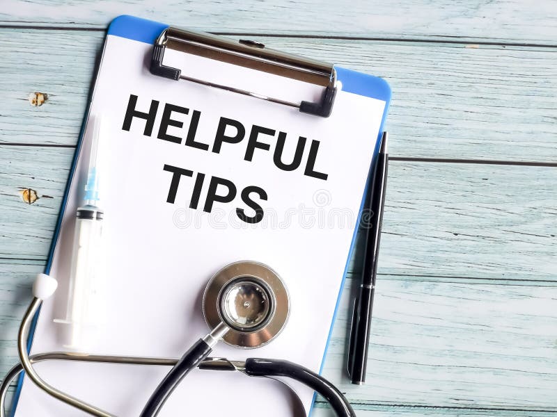 Phrase Helpful Tips Written on Paper Clipboard with Stethoscope,syringe ... Phrase Helpful Tips Written on Paper Clipboard with Stethoscope,syringe ...
