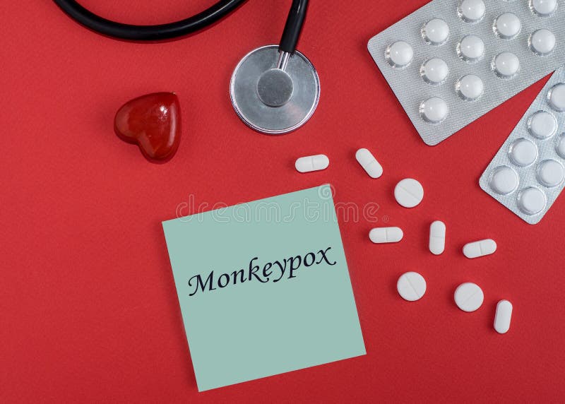Phrase MONKEYPOX on Red Background with Pills. Stock Photo - Image of ...