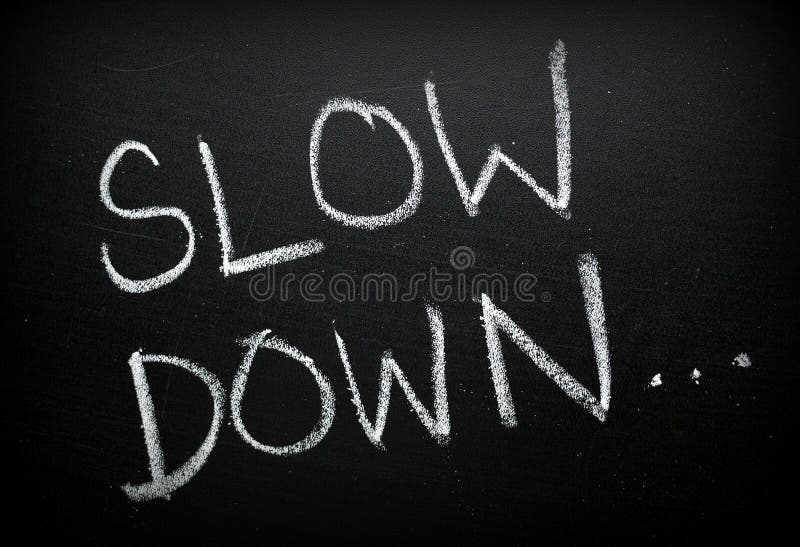 The Words Slow Down Written On A Blackboard Stock Image - Image of ...