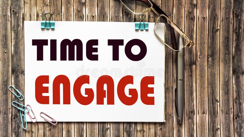 Time To Engage is Shown Using the Text and Picture of Clock Stock Image ...