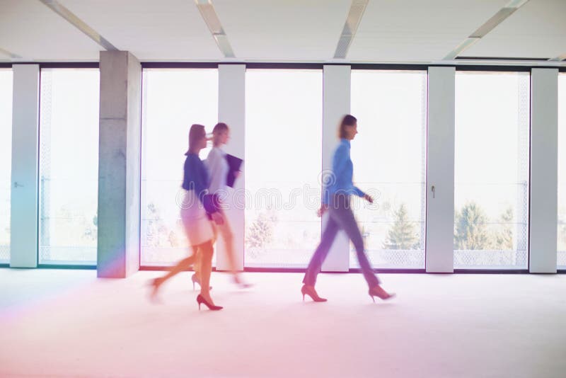 Business People Walking in Office Hall Stock Image - Image of yellow ...
