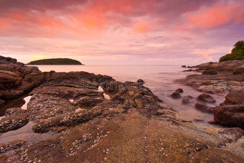 Phuket Beach at Sunrise with Interesting Rocks in Foreground Stock ...