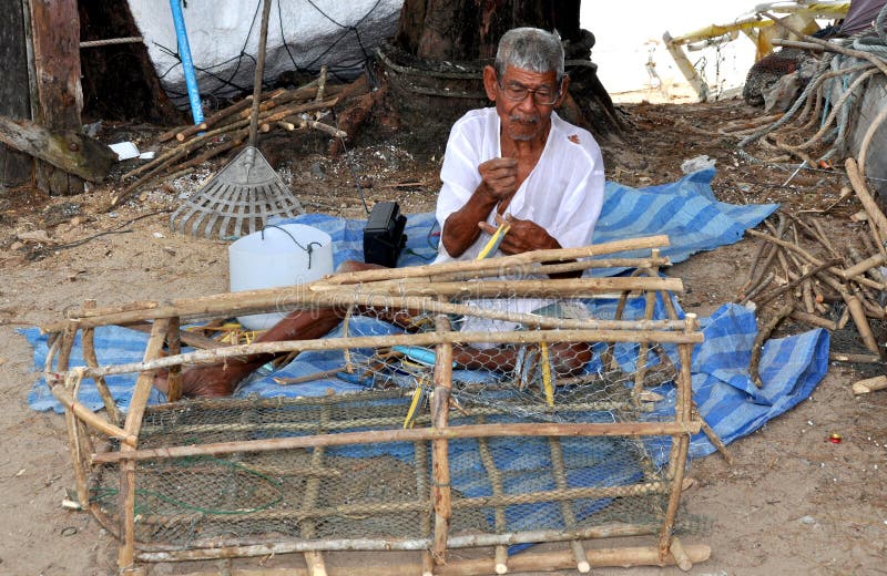 Phuket, Thailand: Fisherman Mending Trap Net Editorial Stock Photo ...